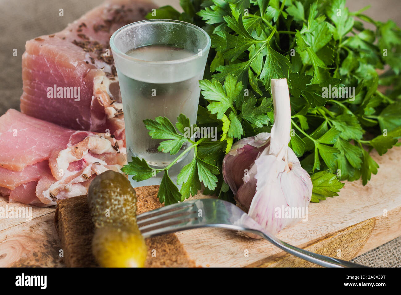 Feast in Russian - vodka and snack - lard, garlic, bread Stock Photo ...