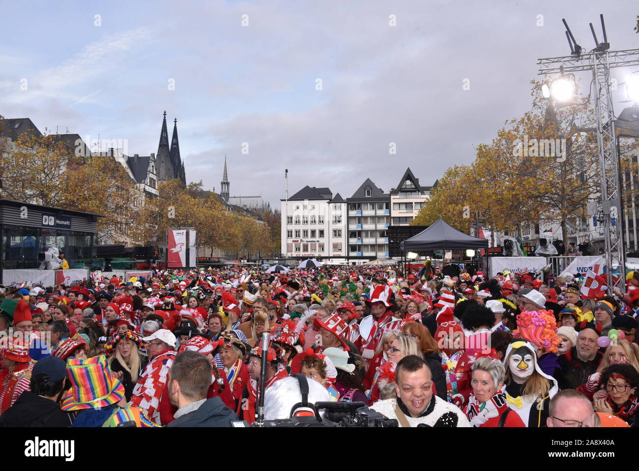 Cologne, Germany. 11th Nov, 2019. Carnivalists in costume in front of ...