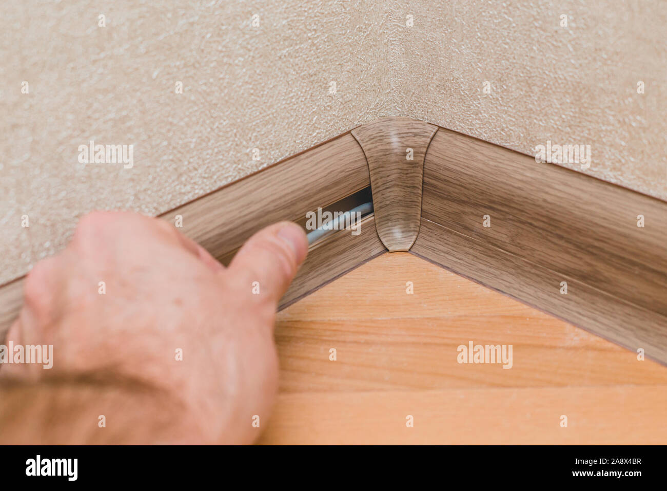 Laying in plinth communication cable hi-res stock photography and ...