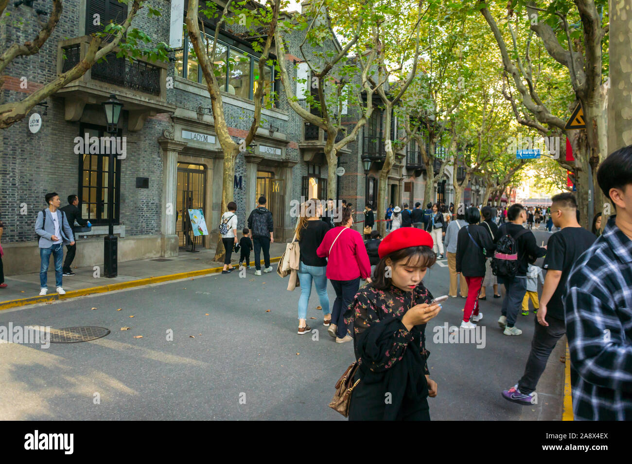 Shanghai, China, Crowds of Chinese People Walking on City Street Scenes ...