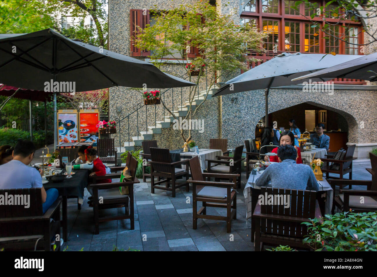 Shanghai, China, People on terrace of Fancy Chinese Restaurant Street ...