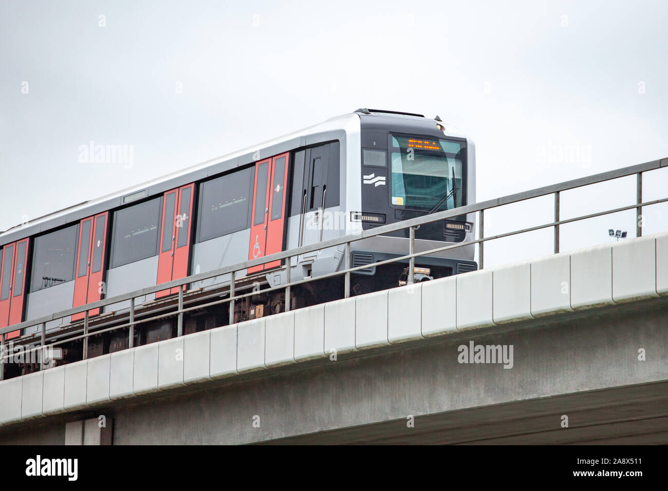 Skytrain in city Amsterdam. Passenger train in Netherlands ...