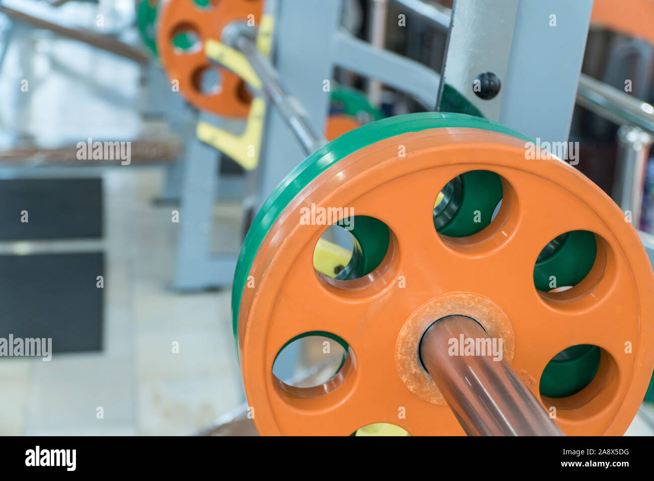 sports equipment and barbells in the gym, close-up Stock Photo - Alamy