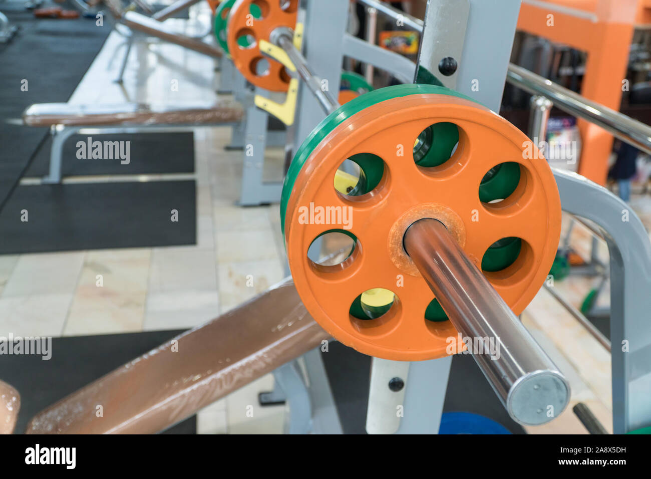 sports equipment and barbells in the gym Stock Photo - Alamy