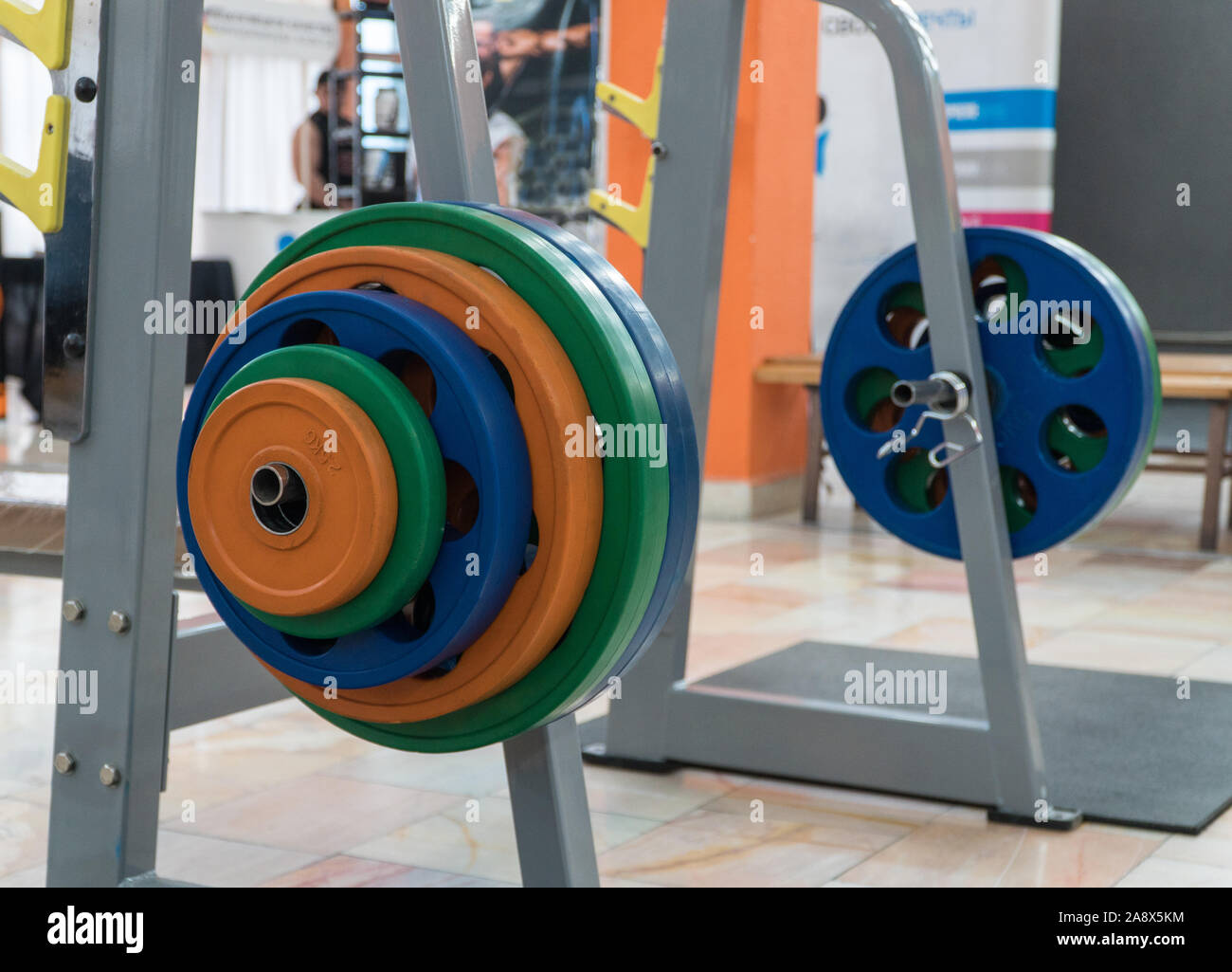 Row barbells in gym hi-res stock photography and images - Alamy