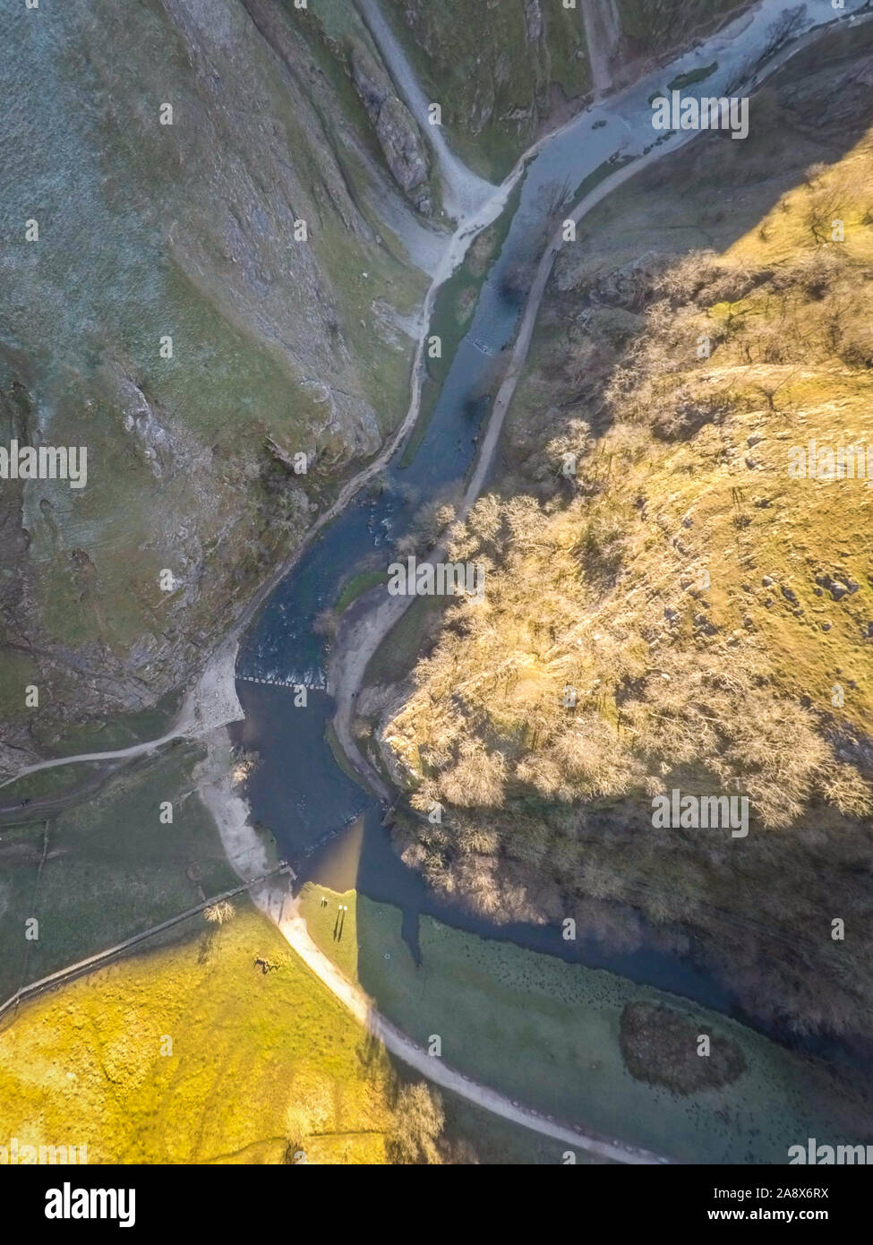 Aerial views of the stunning Dovedale stepping stones and mountains in ...