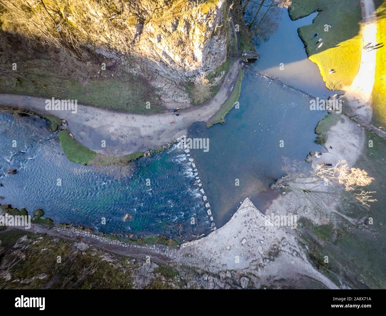 Aerial views of the stunning Dovedale stepping stones and mountains in ...