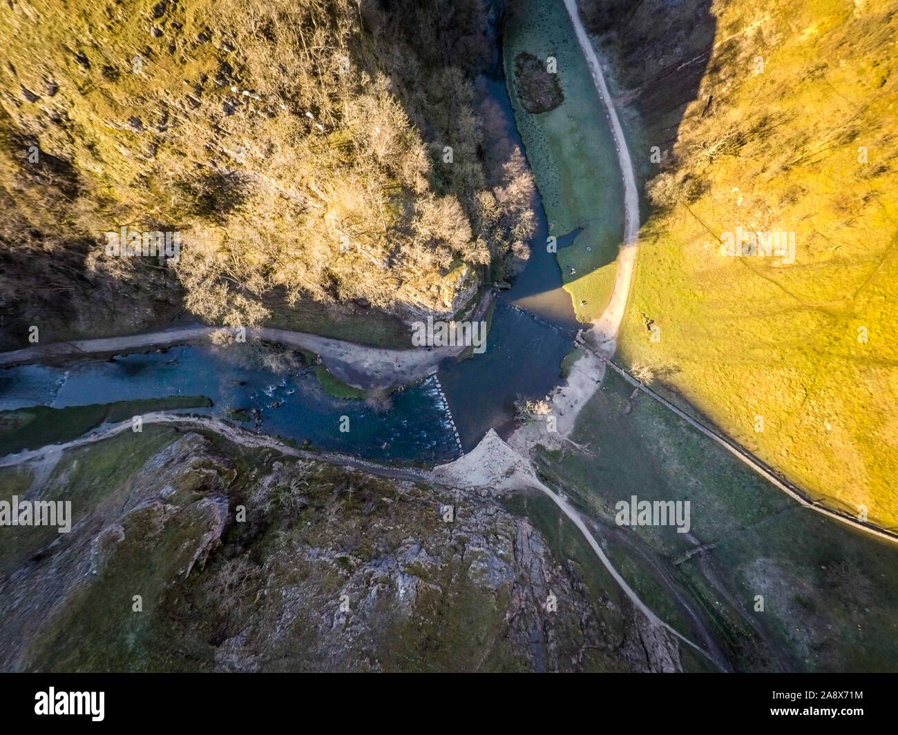 Aerial views of the stunning Dovedale stepping stones and mountains in ...