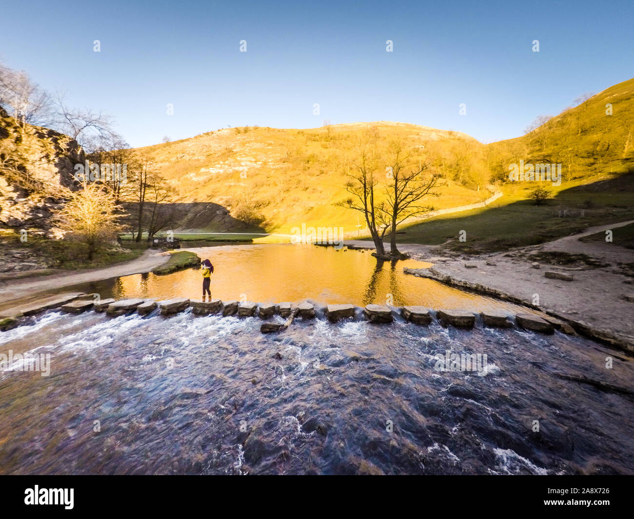 Aerial views of the stunning Dovedale stepping stones and mountains in ...