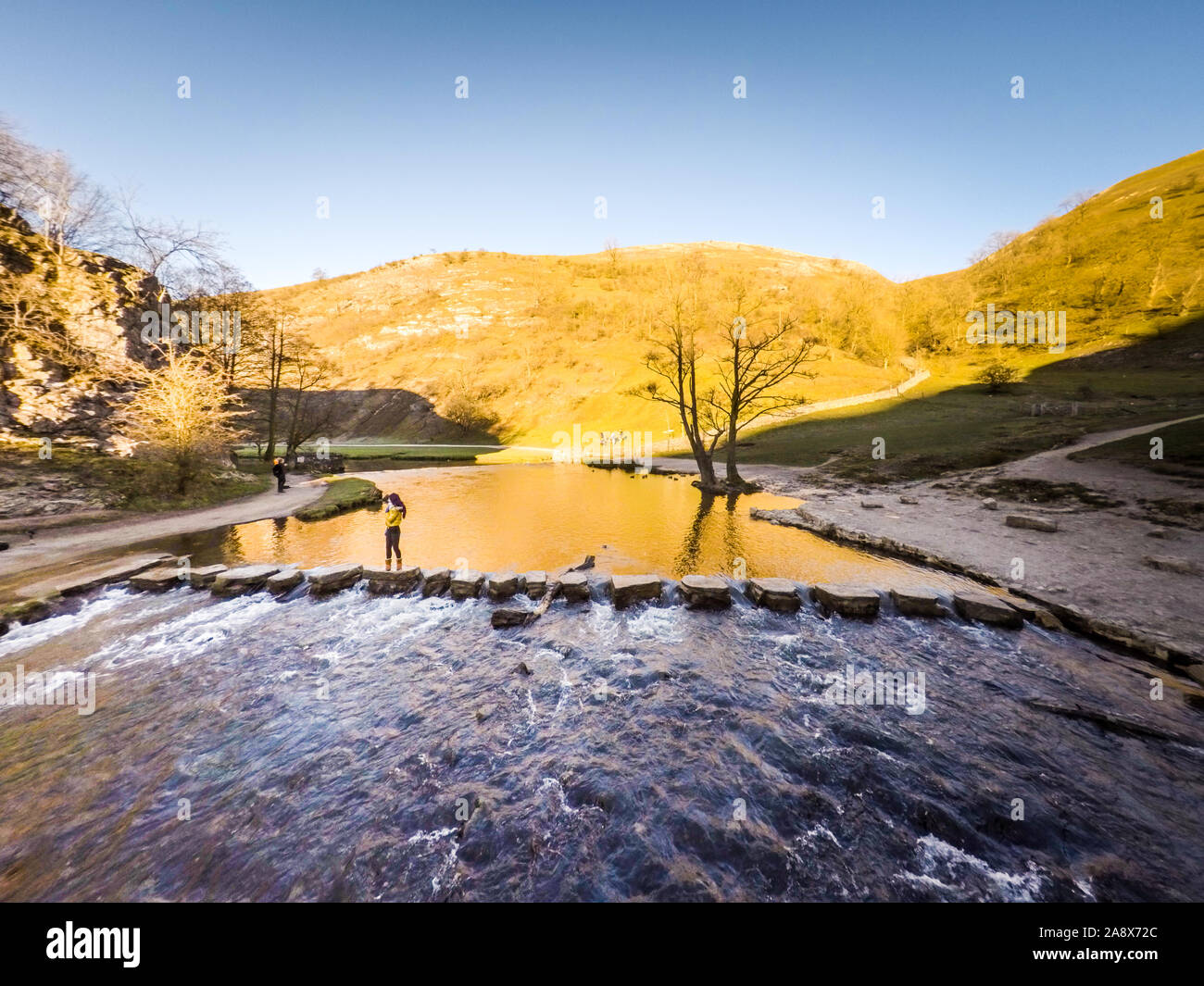 Aerial views of the stunning Dovedale stepping stones and mountains in ...