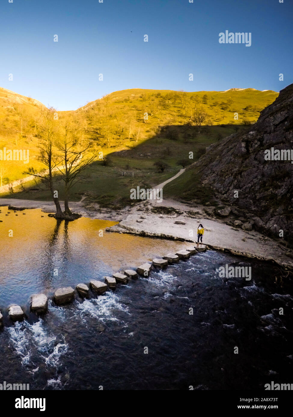 Aerial views of the stunning Dovedale stepping stones and mountains in ...