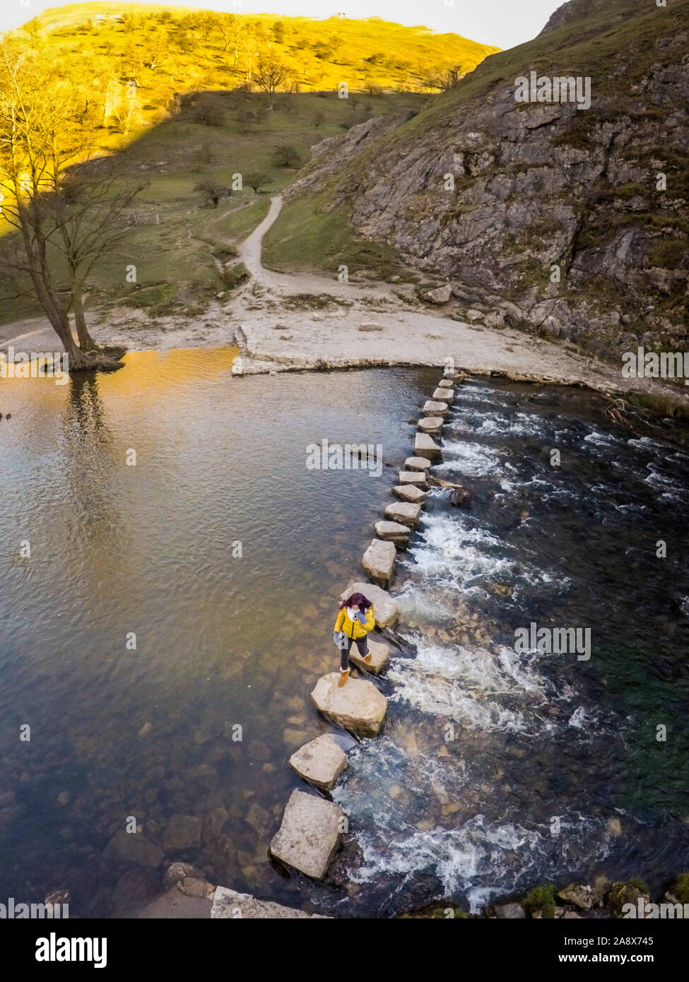 Aerial views of the stunning Dovedale stepping stones and mountains in ...
