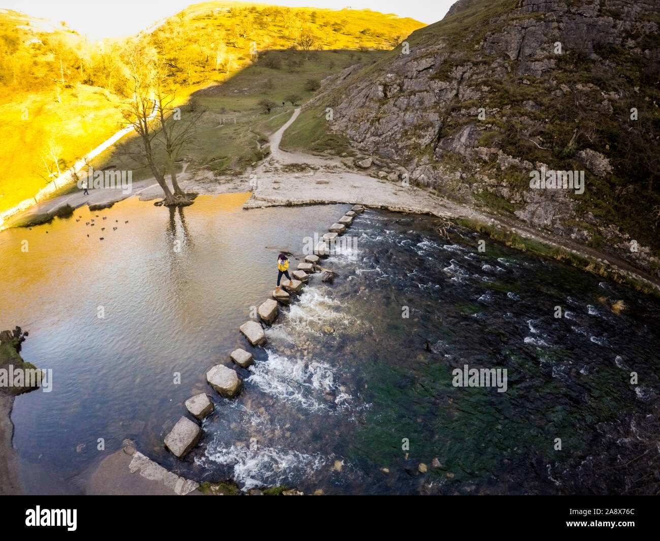 Aerial views of the stunning Dovedale stepping stones and mountains in ...