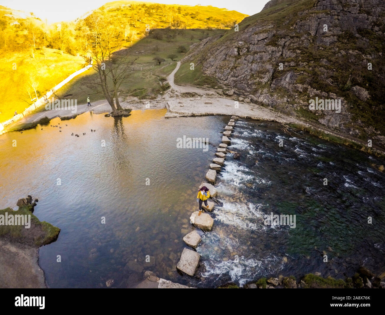 Aerial views of the stunning Dovedale stepping stones and mountains in ...