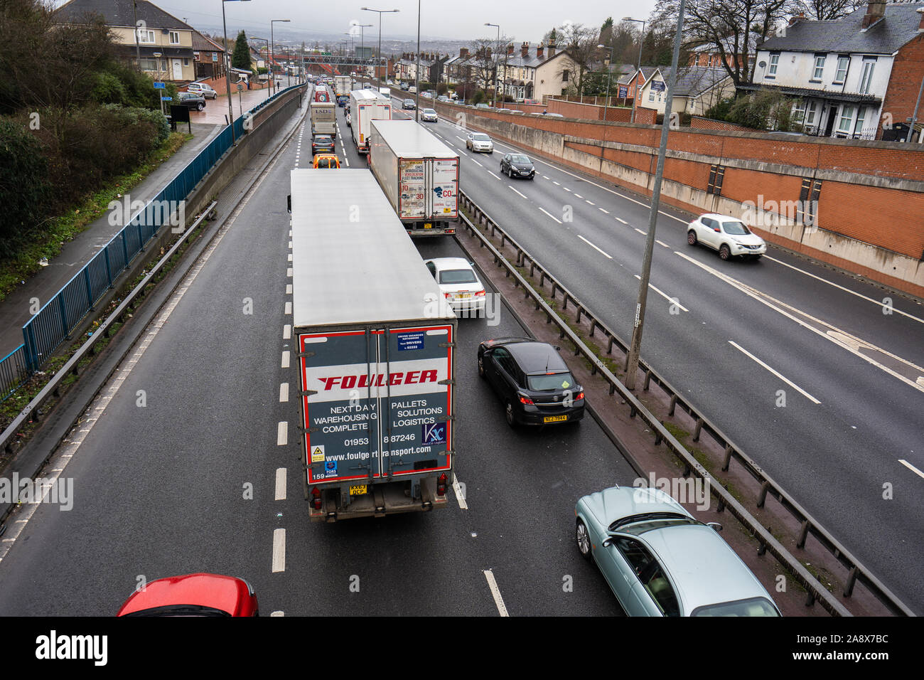 Logistic lorries and haulage vehicles, cars and work transport stuck in ...