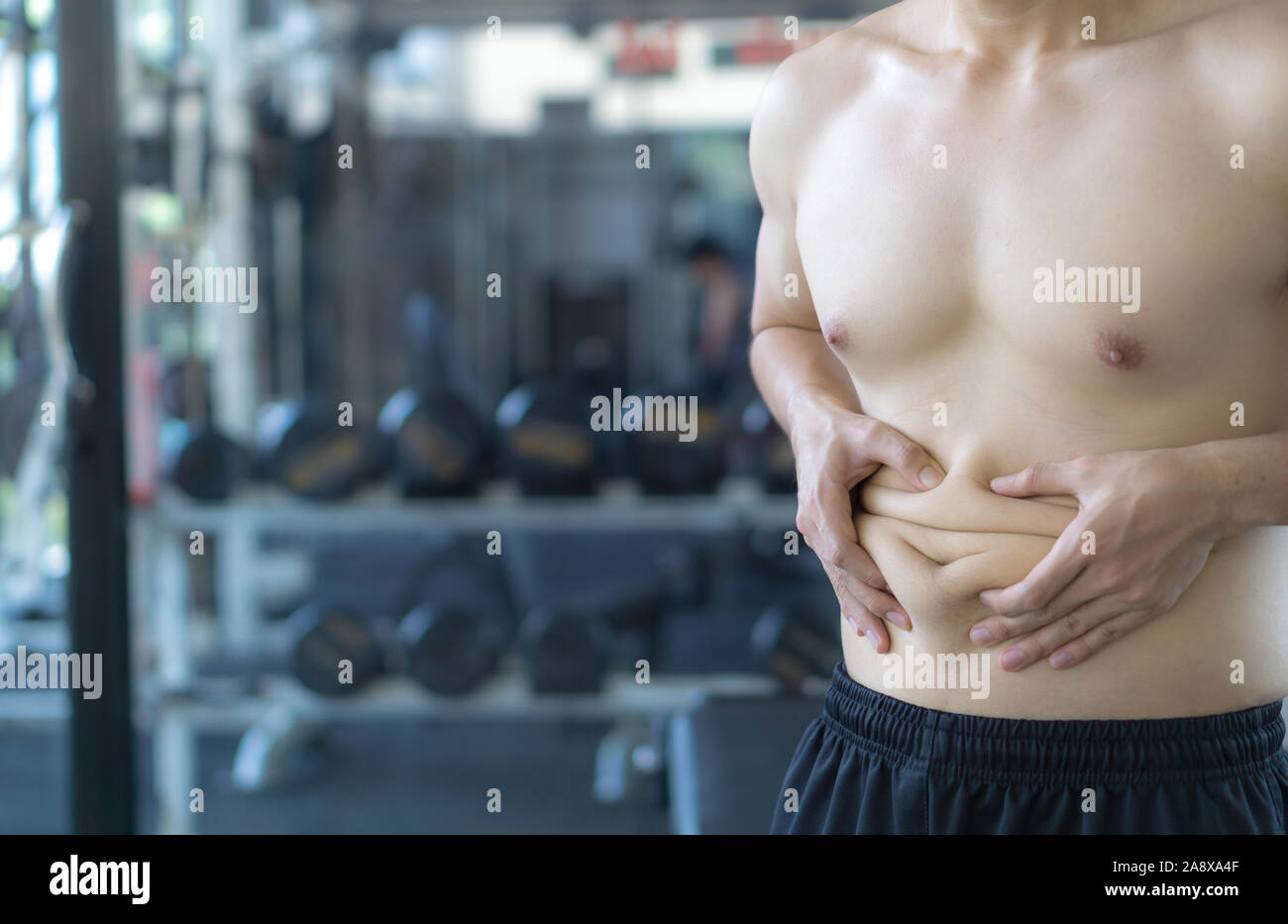 Close up man holding excessive fat belly. Man overweight abdomen. Man ...