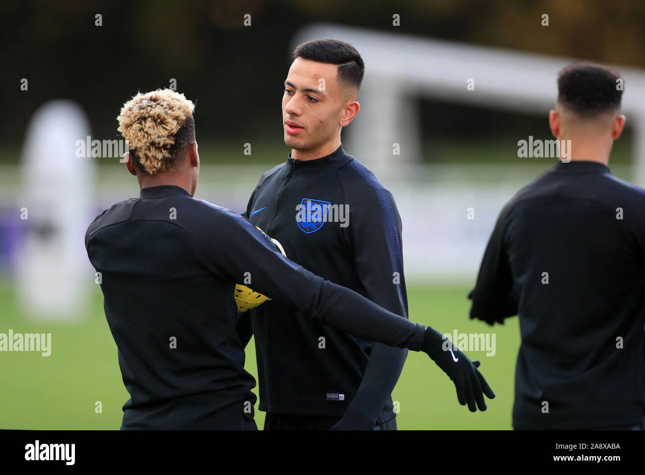 England's Dwight McNeil (centre) during the training session at St ...