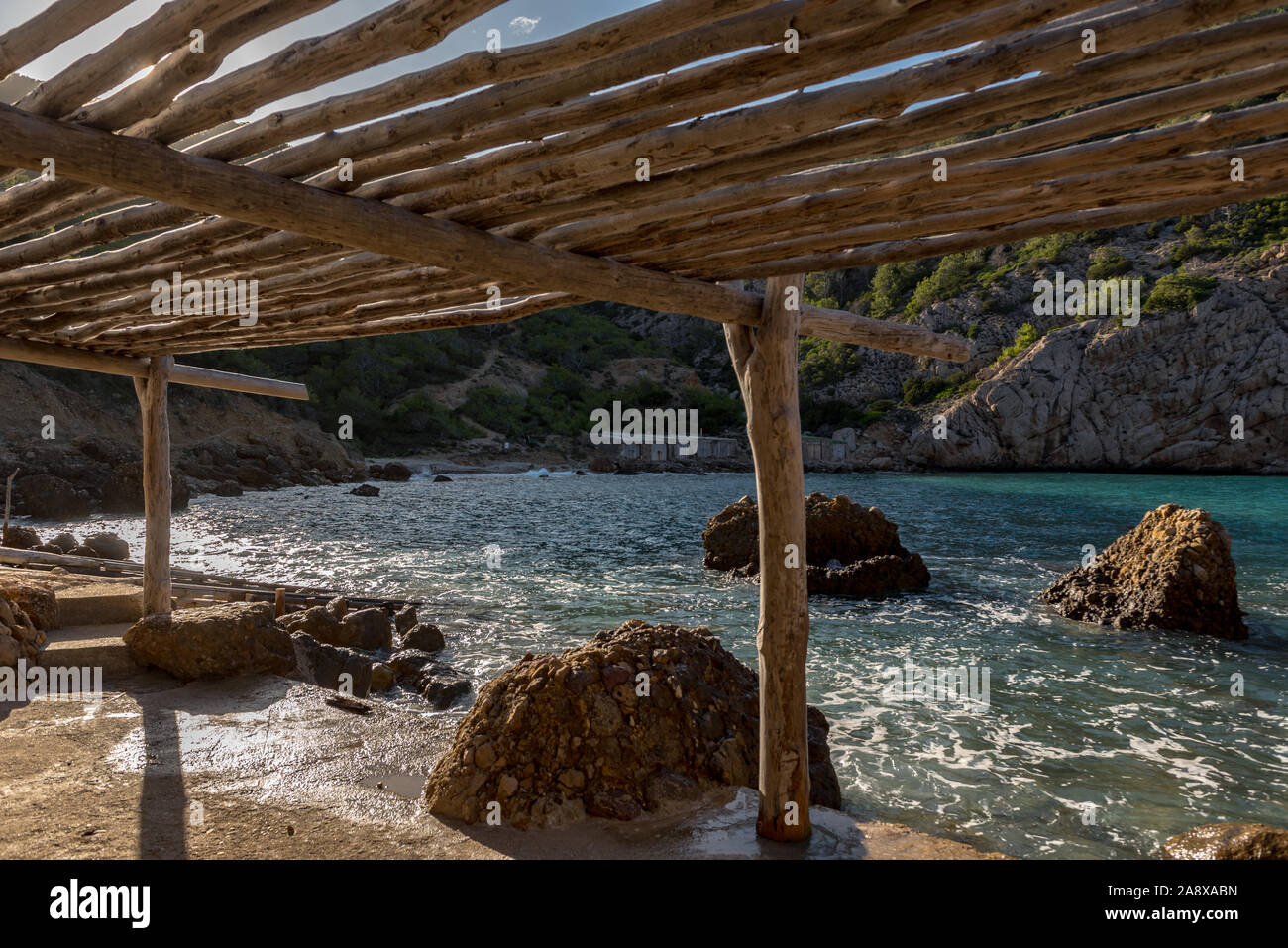 Turquoise waters in Es Portitxol, Ibiza, Spain. Hidden bay on the ...