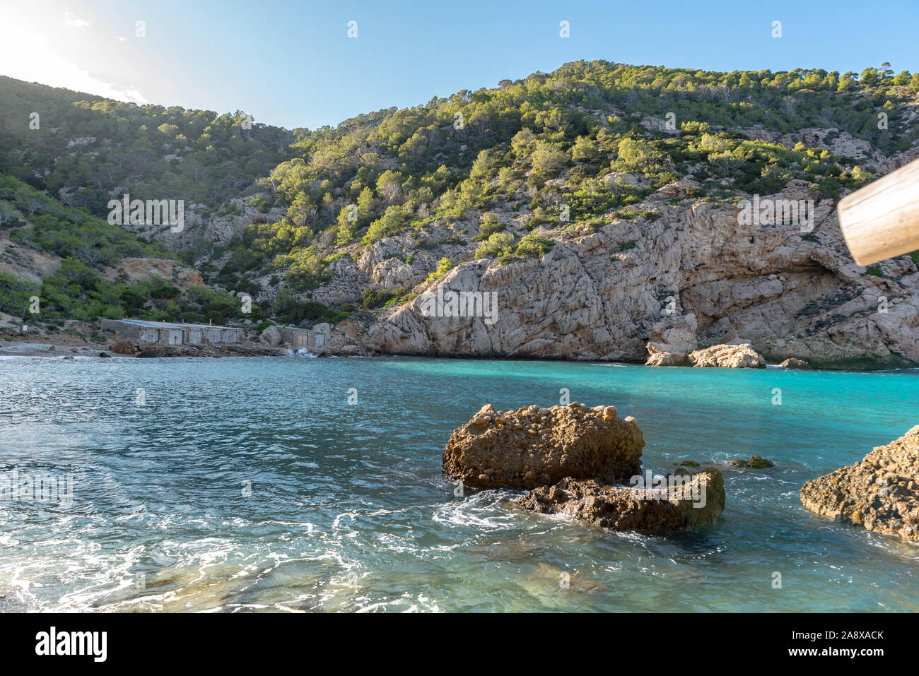 Turquoise waters in Es Portitxol, Ibiza, Spain. Hidden bay on the ...