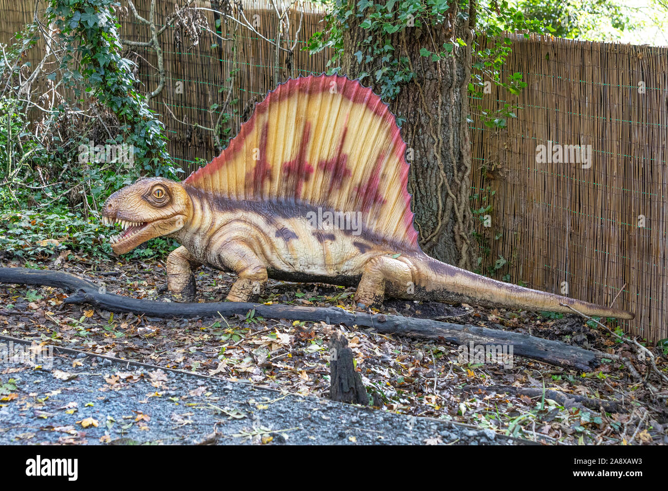 A Model Dinosaur in woodland Stock Photo - Alamy