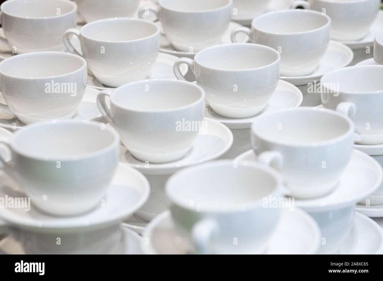 A lot of white cups for coffee. Catering Stock Photo - Alamy