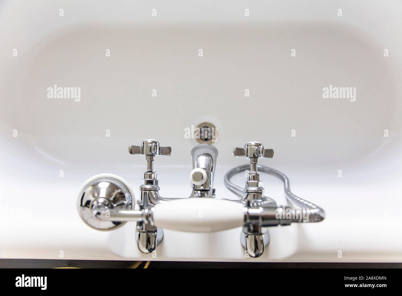 Luxury bathroom interior with classic rolltop bath tub and vintage tap ...