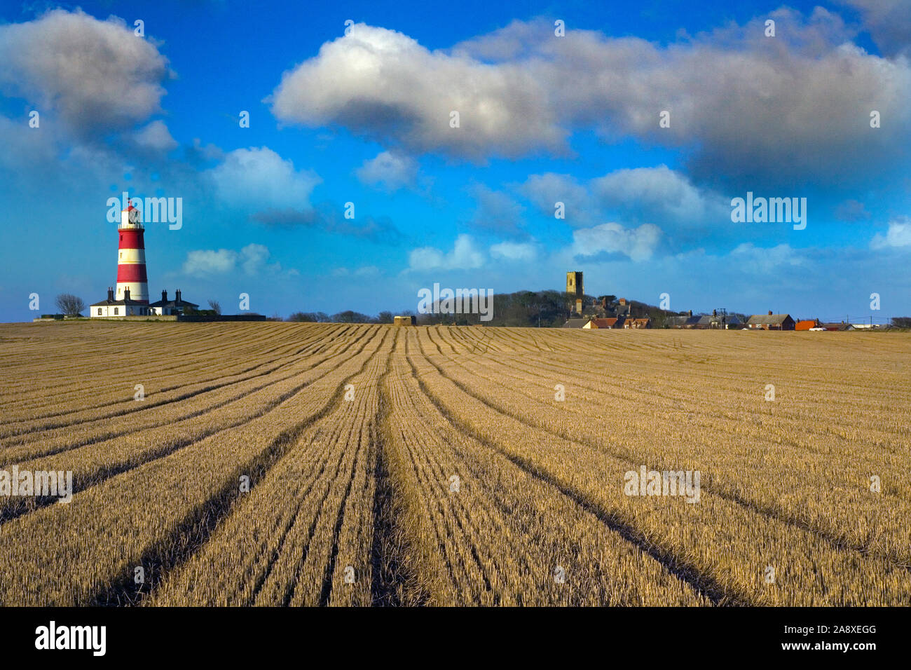 Light house and wheat field at Happisburgh Norfolk UK August Stock ...