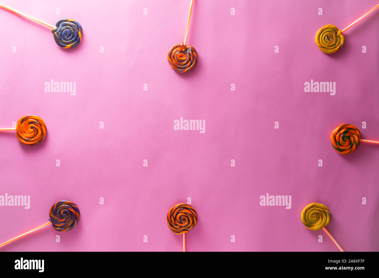 Candy lollipops, sweet lollies isolated on pink background, with ...