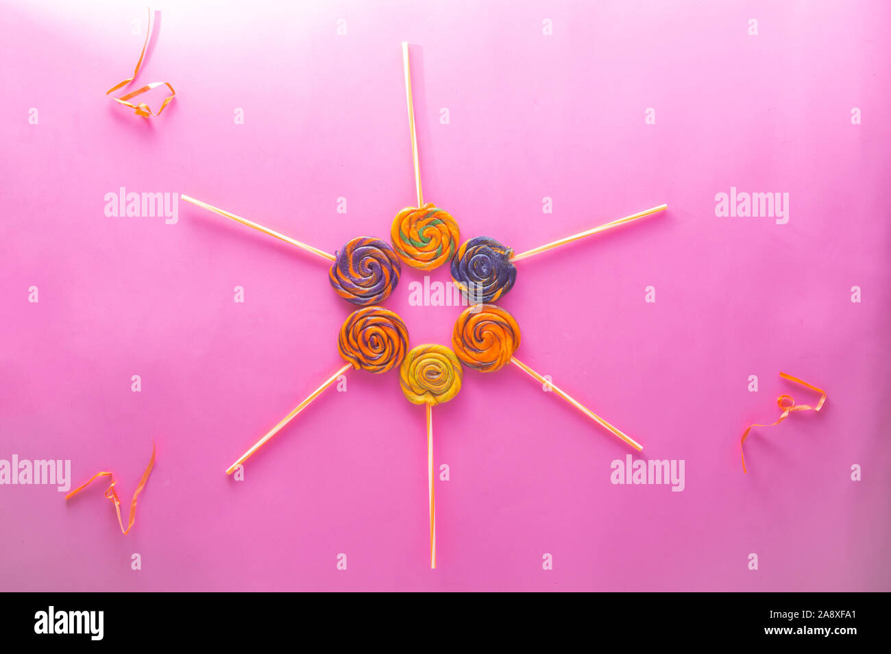 Candy lollipops, sweet lollies isolated on pink background, with ...