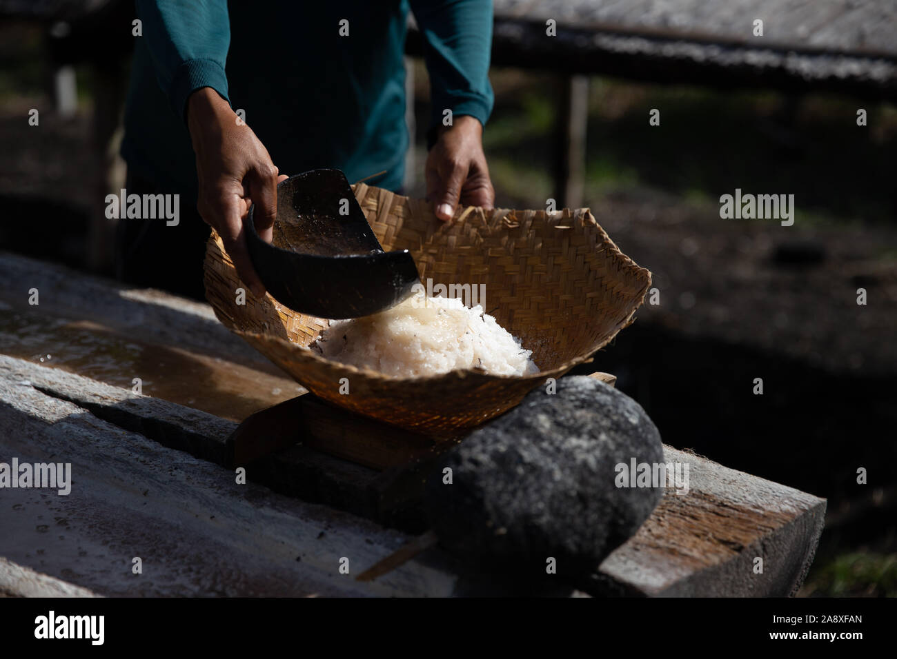 One of the stages to making natural sea salt Stock Photo - Alamy