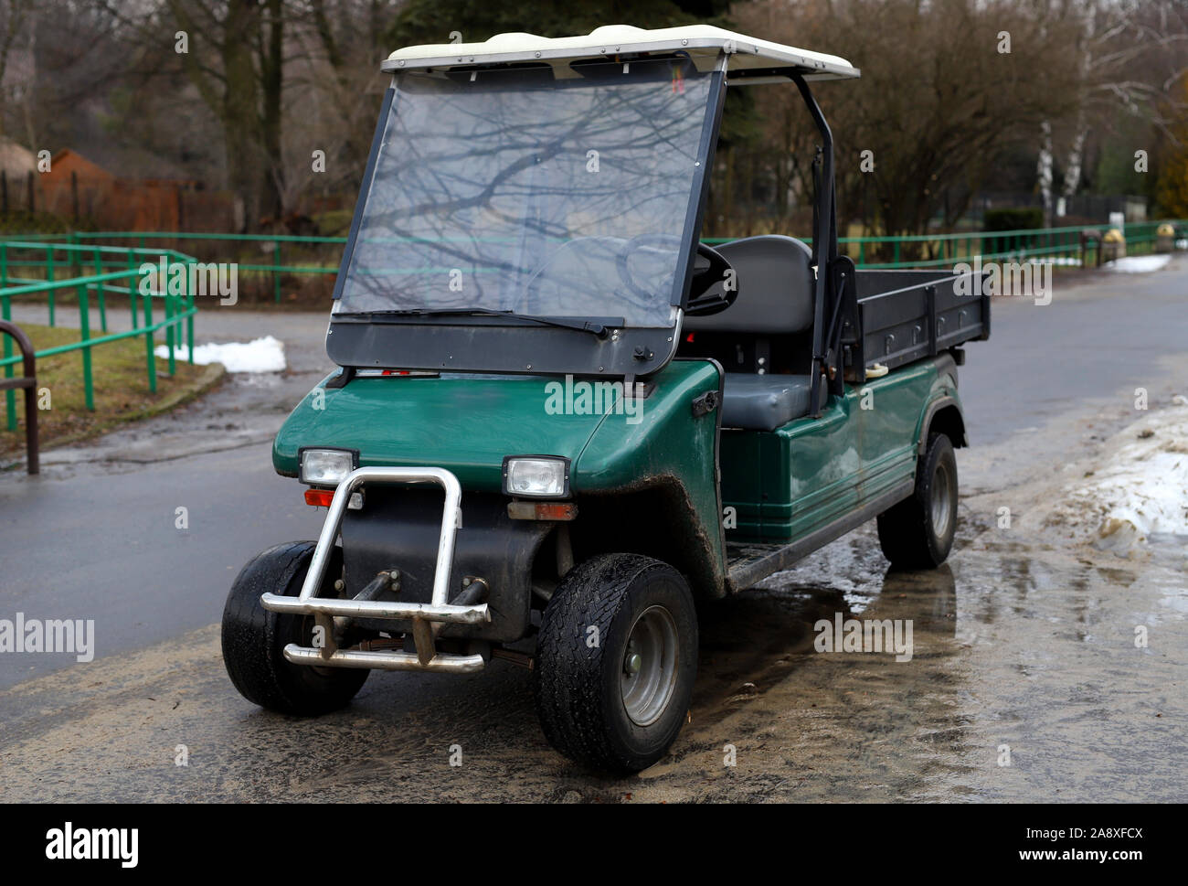a small electric car with a loading case Stock Photo - Alamy