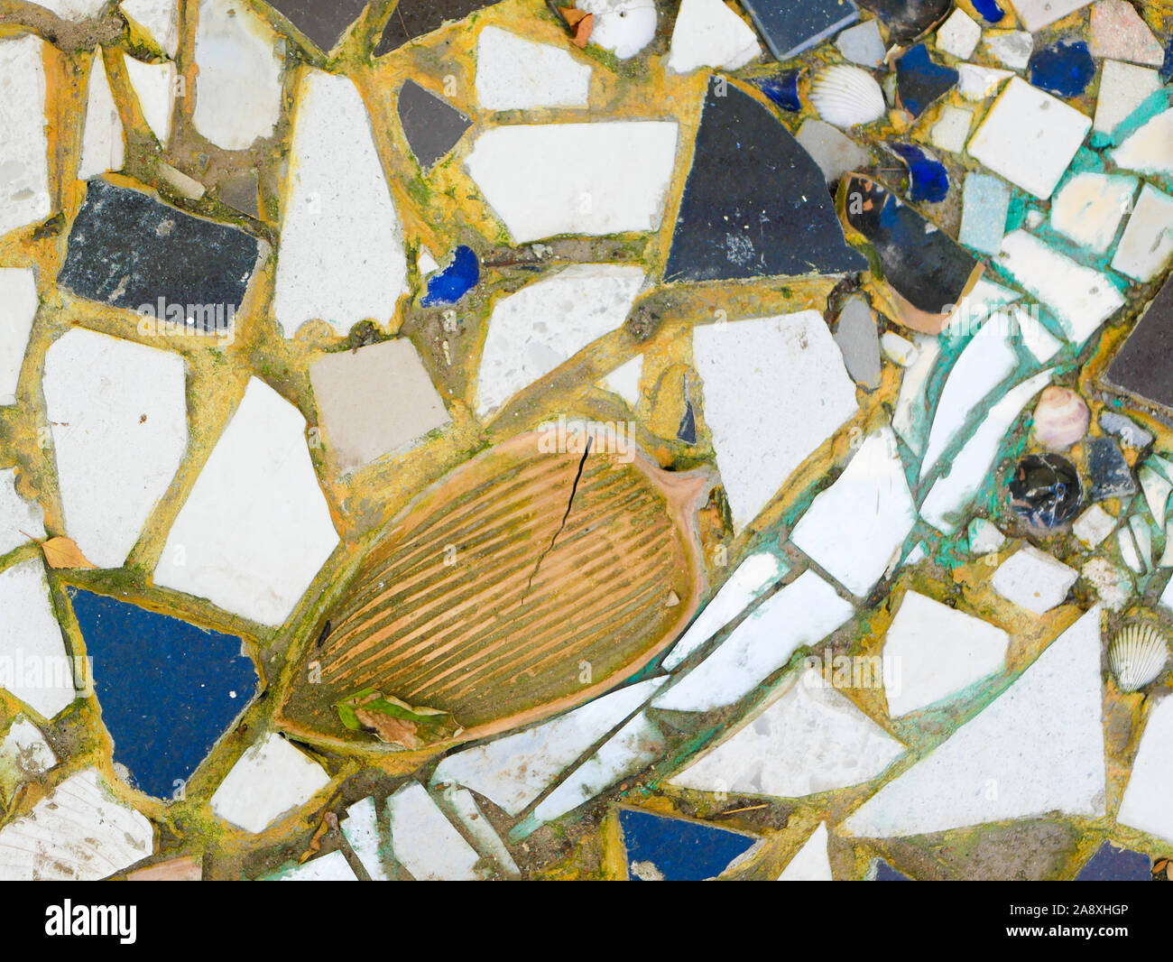 Background from multi-colored tiles on the wall. Pattern of broken ...