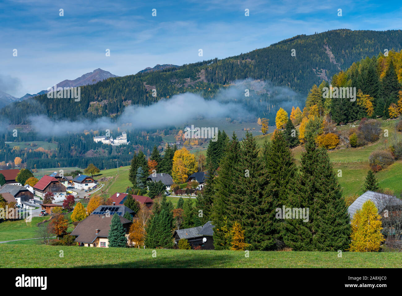 The Moosham Castle with fall foliage color near Unternberg in the ...