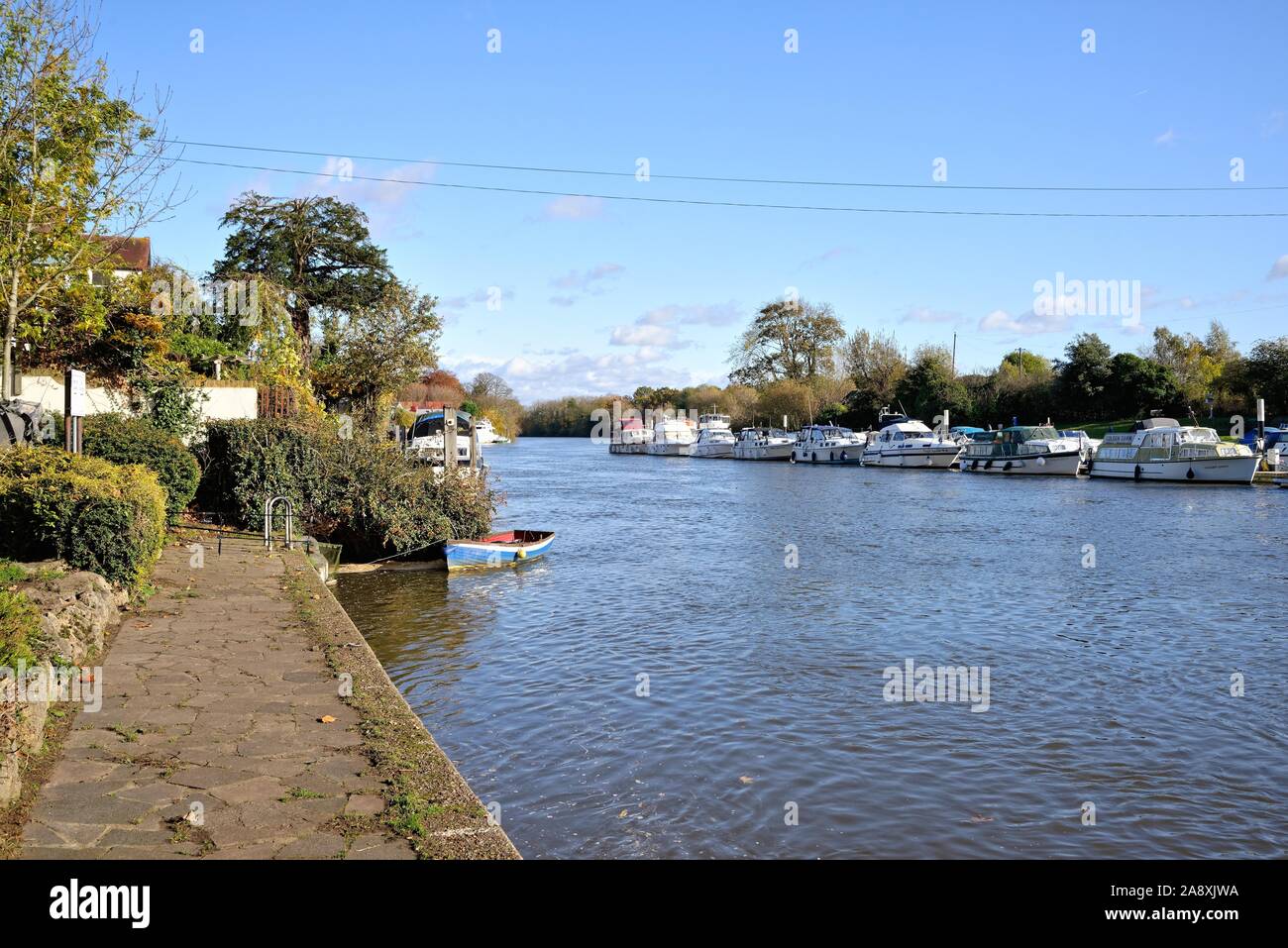 A sunny autumnal day by the River Thames at Lower Sunbury Surrey ...