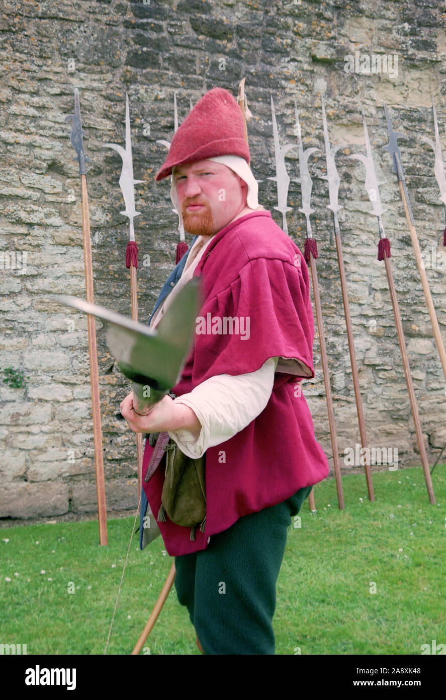 Actor in a medieval reenactment with a weapon Stock Photo - Alamy