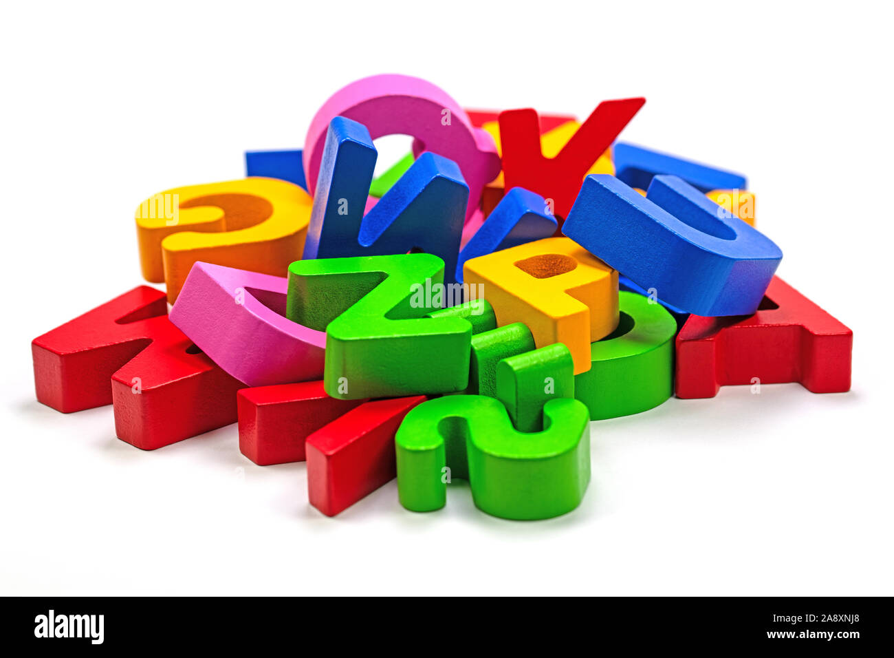 Colorful wooden letters against white background Stock Photo - Alamy