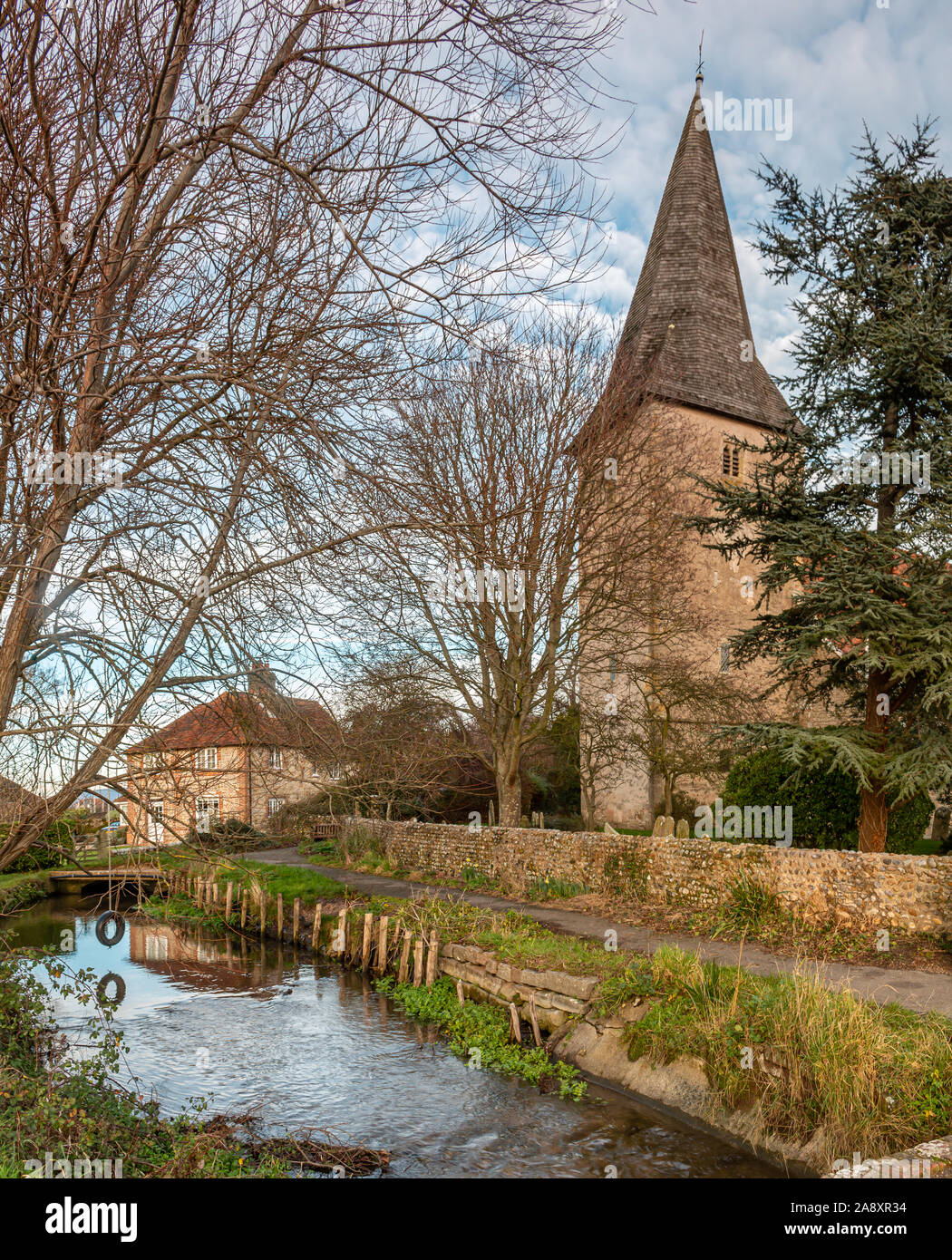 Bosham Church and brook Stock Photo - Alamy
