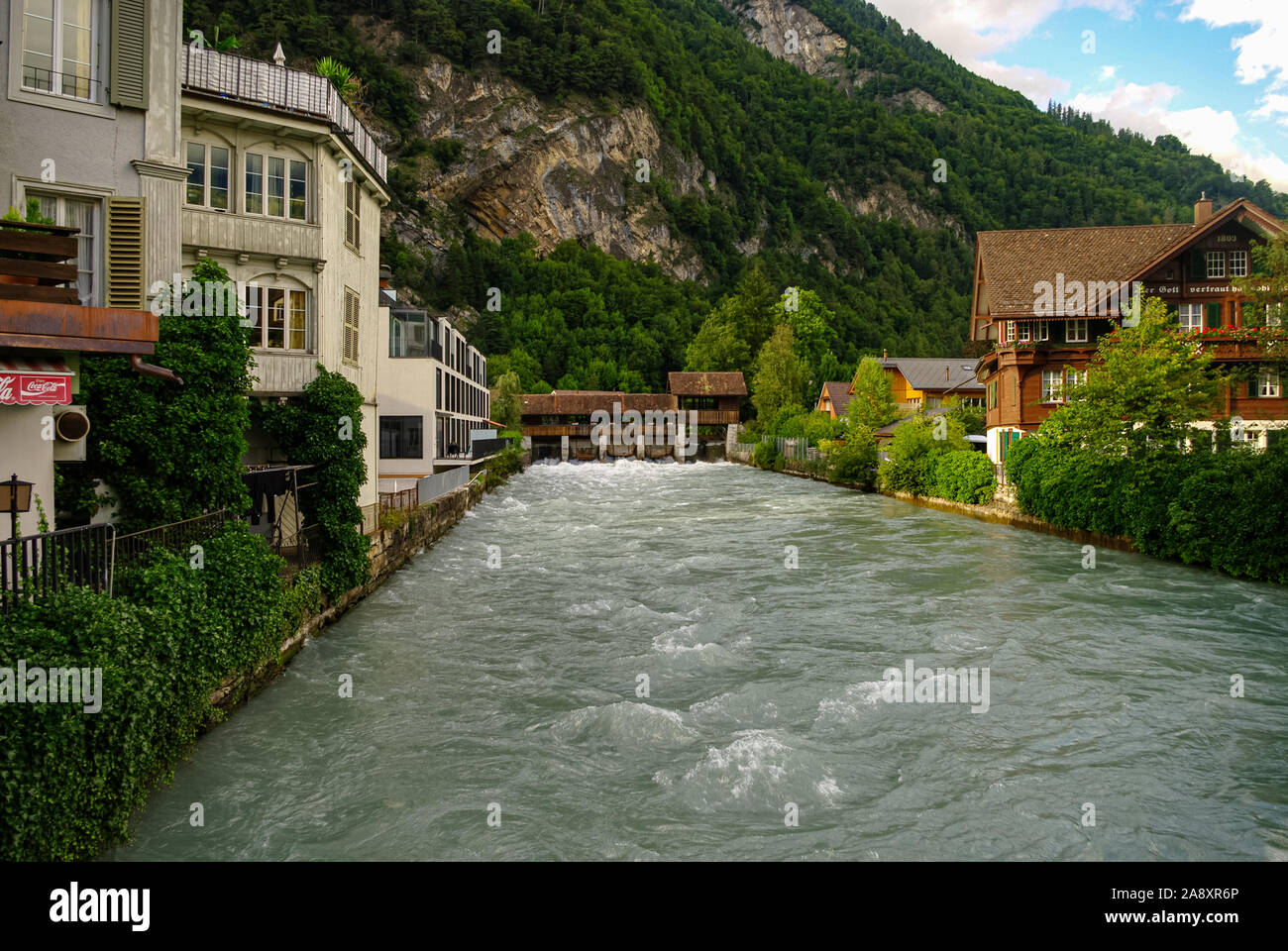 Interlaken, Switzerland - Agust 24, 2010: Aare river and vintage Swiss ...