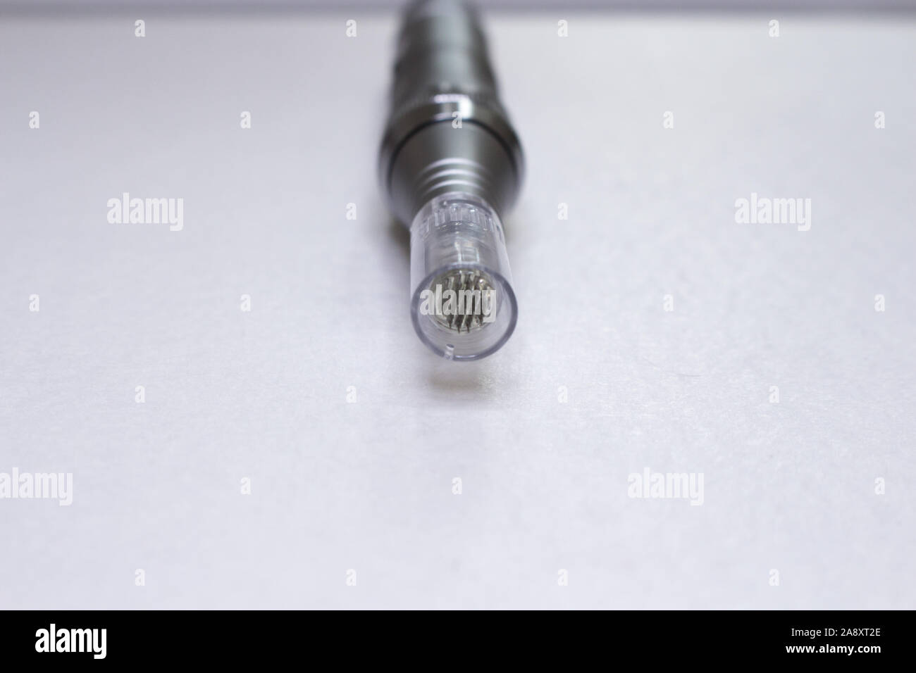 Dermis stamp electric pen. Dermapen. Needle mesotherapy treatment Stock ...