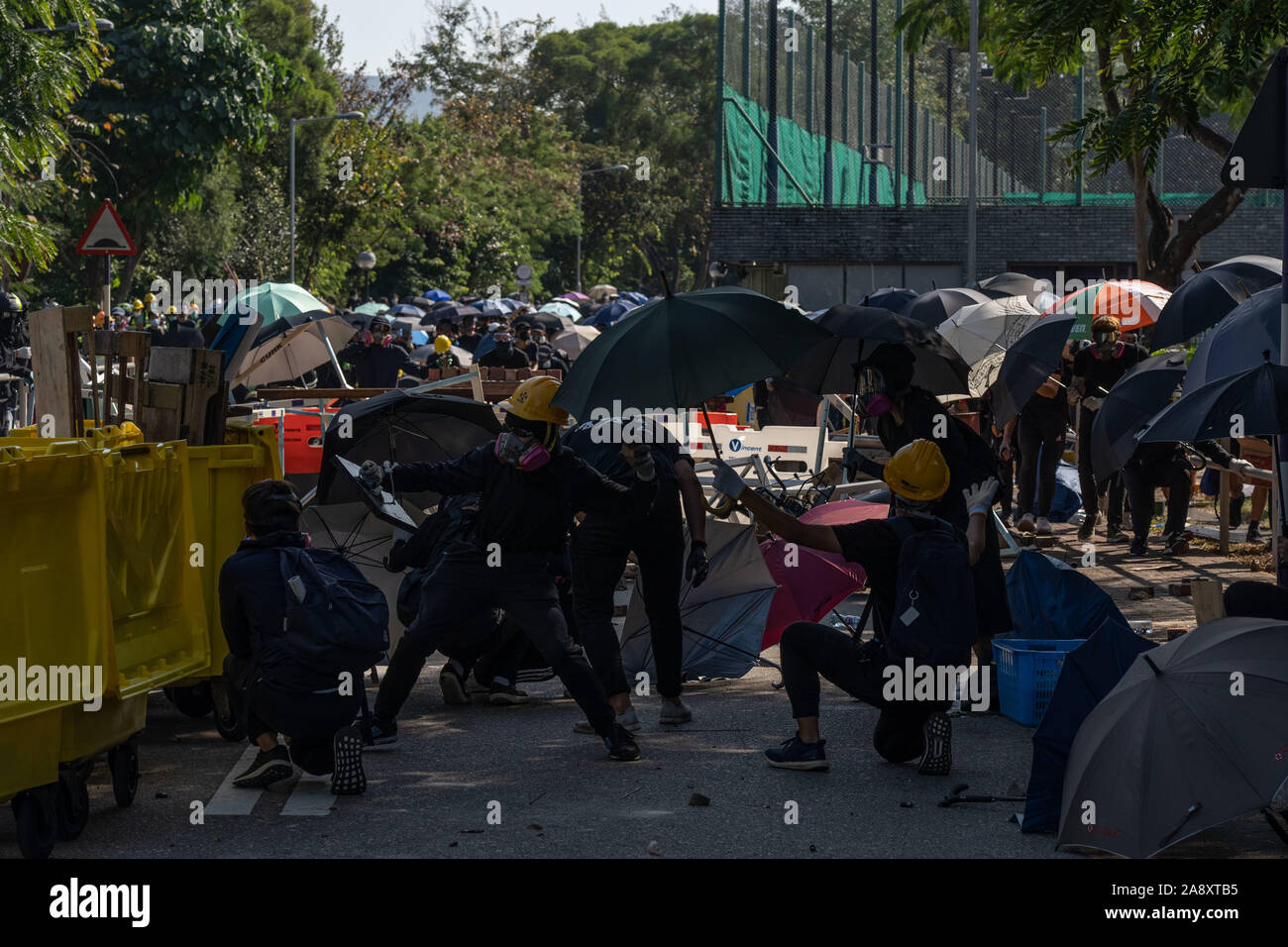 Hong Kong, Hong Kong. 11th Nov, 2019. Protesters shielding themselves ...