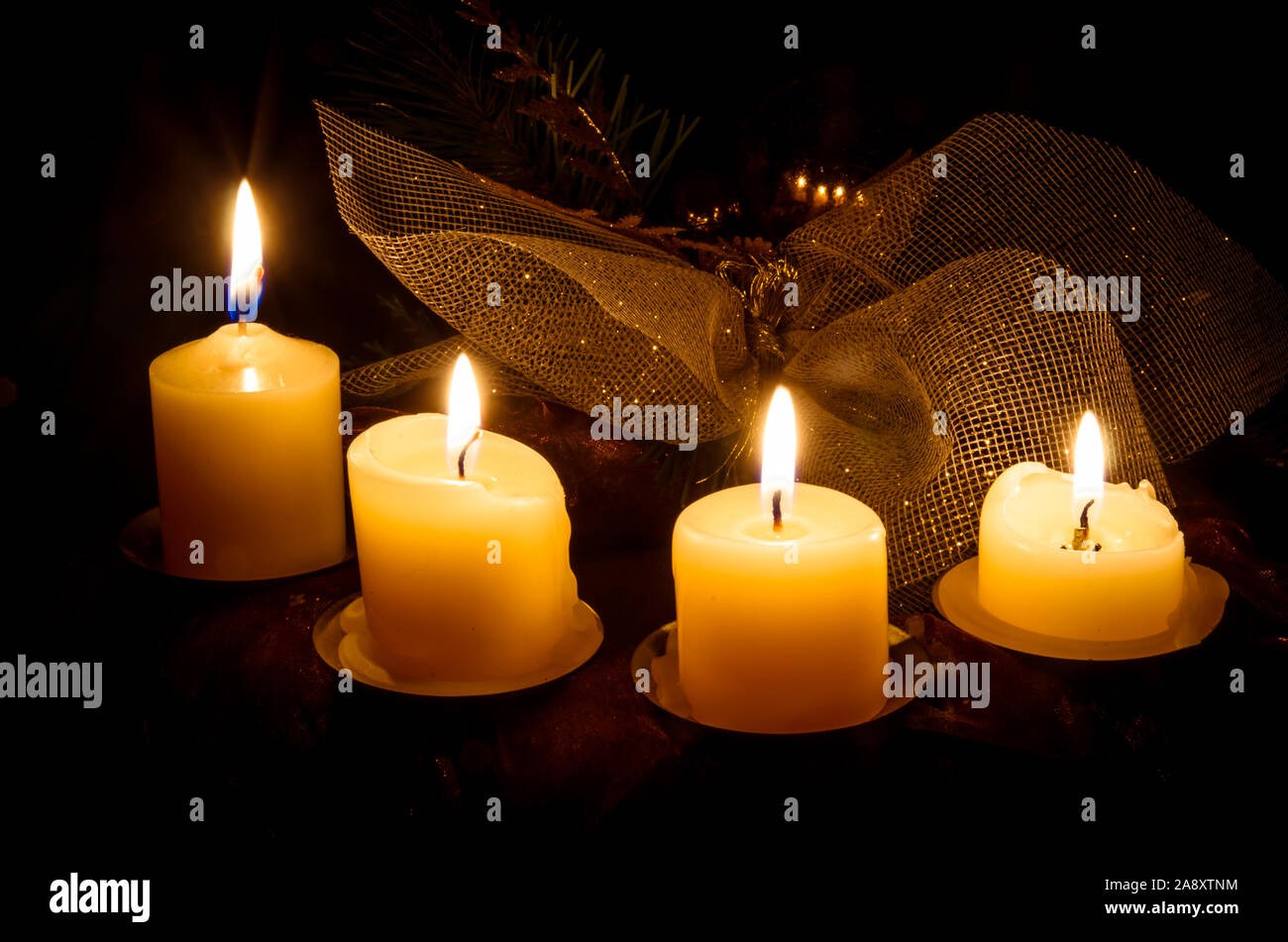Festive advent wreath four glowing hi-res stock photography and images ...