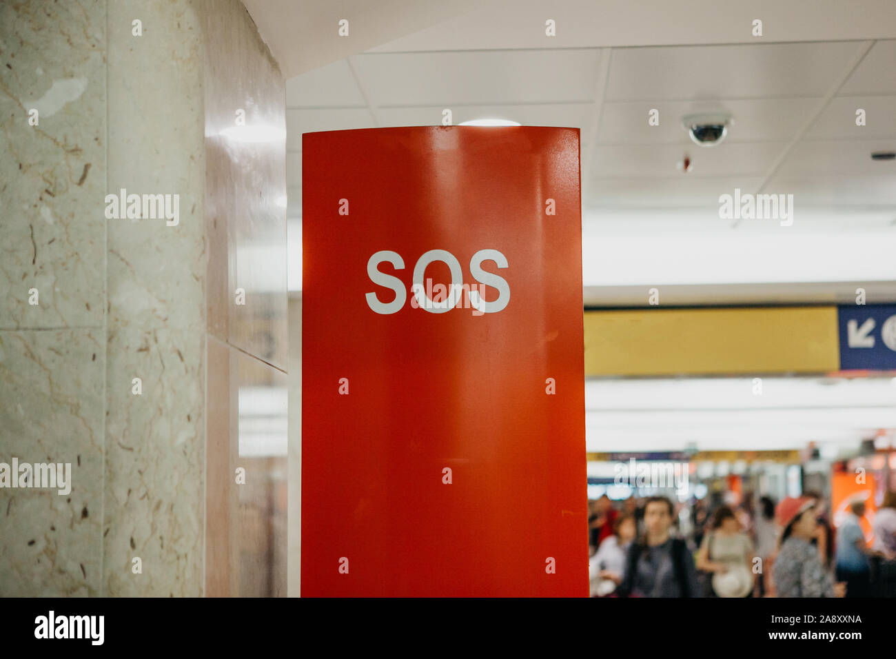 SOS sign on a special stand or booth with a phone for a call at the ...