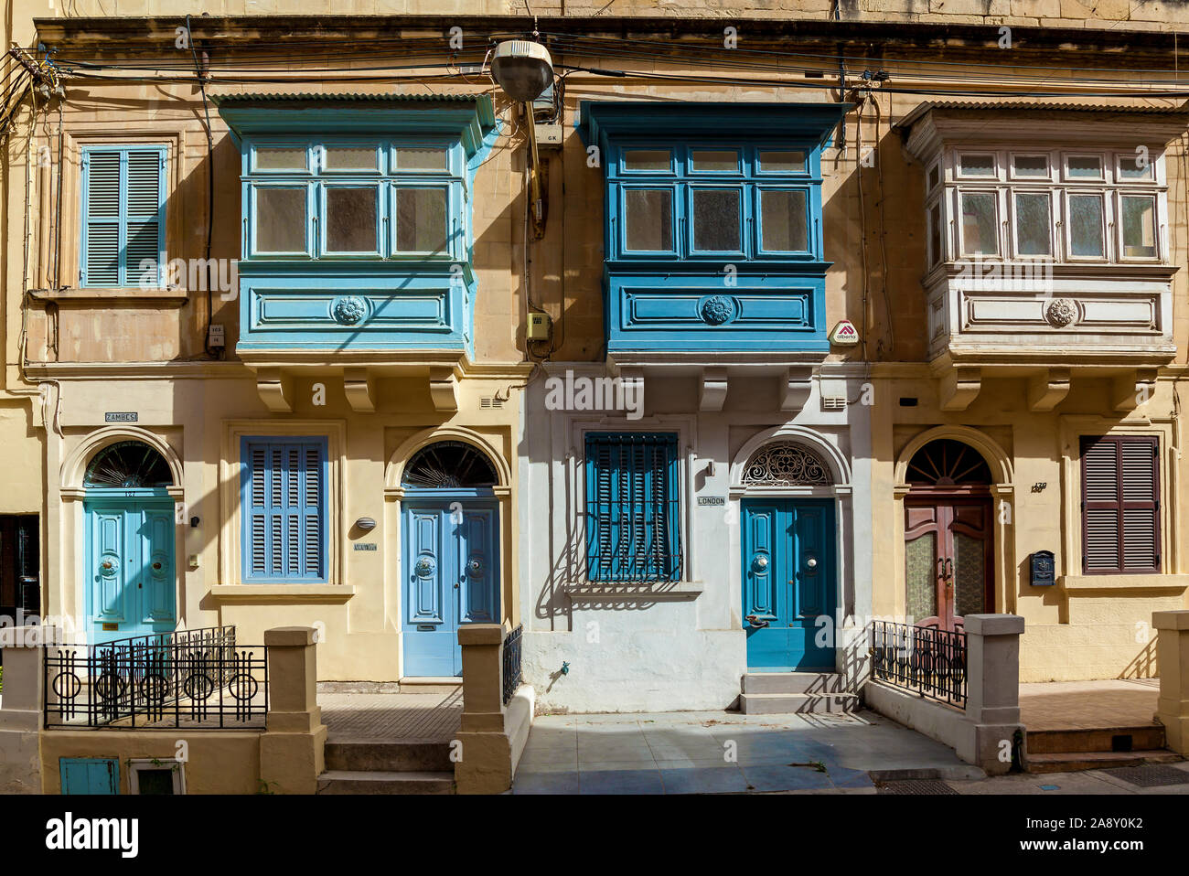 Architecture of Malta, the facade of the house with colorful wooden ...