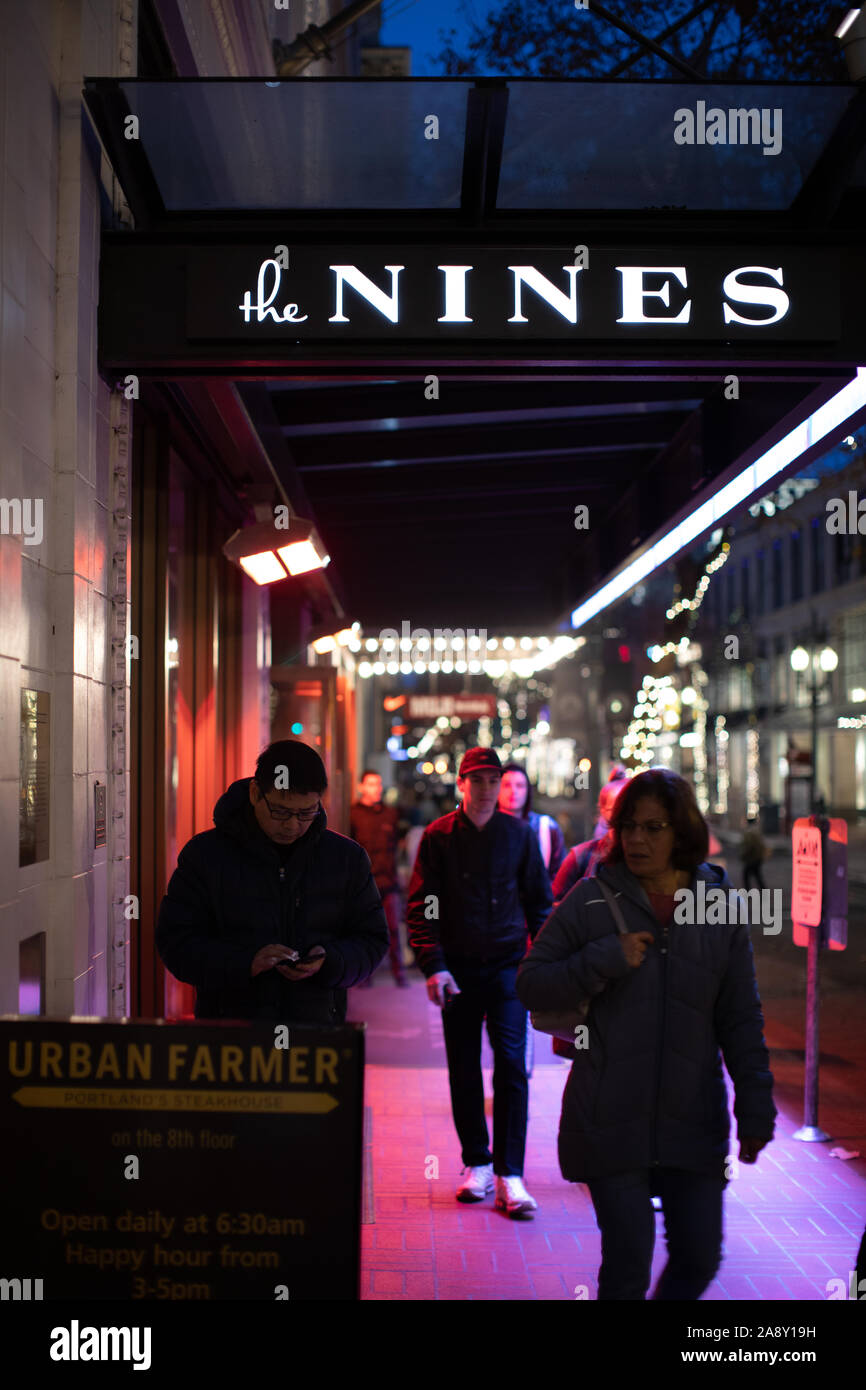 Portland, Oregon - Nov 10, 2019 : People passing in front of Nines, a ...