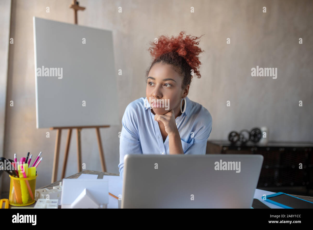 Designer feeling thoughtful while having little break Stock Photo - Alamy Designer feeling thoughtful while having little break Stock Photo - Alamy