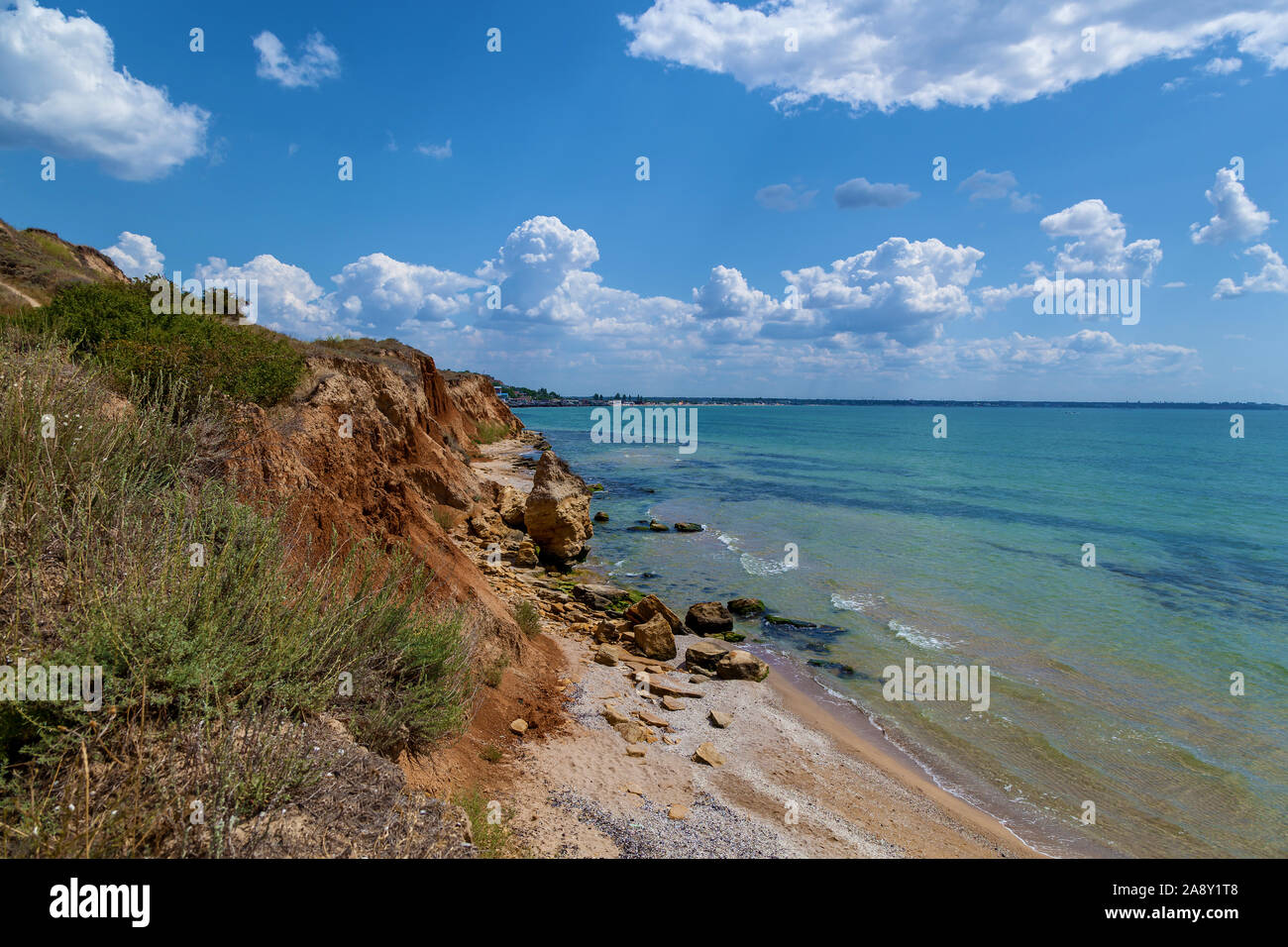 Yellow sandy rocks and stones of various forms on the Black Sea coast ...