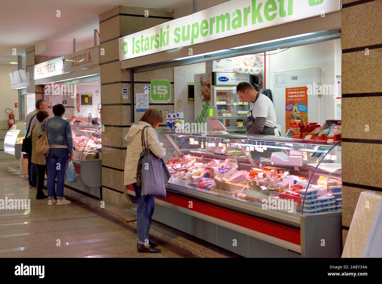 Butchers in meat market Pula, Croatia Stock Photo - Alamy