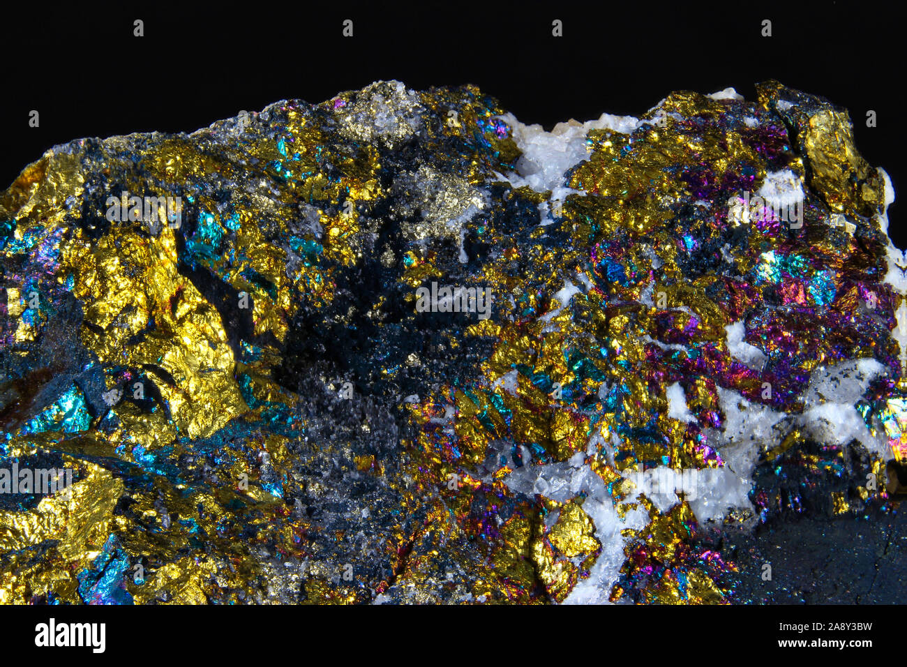 Macro of a Chalcopyrite with small crystals and a variety of colors ...