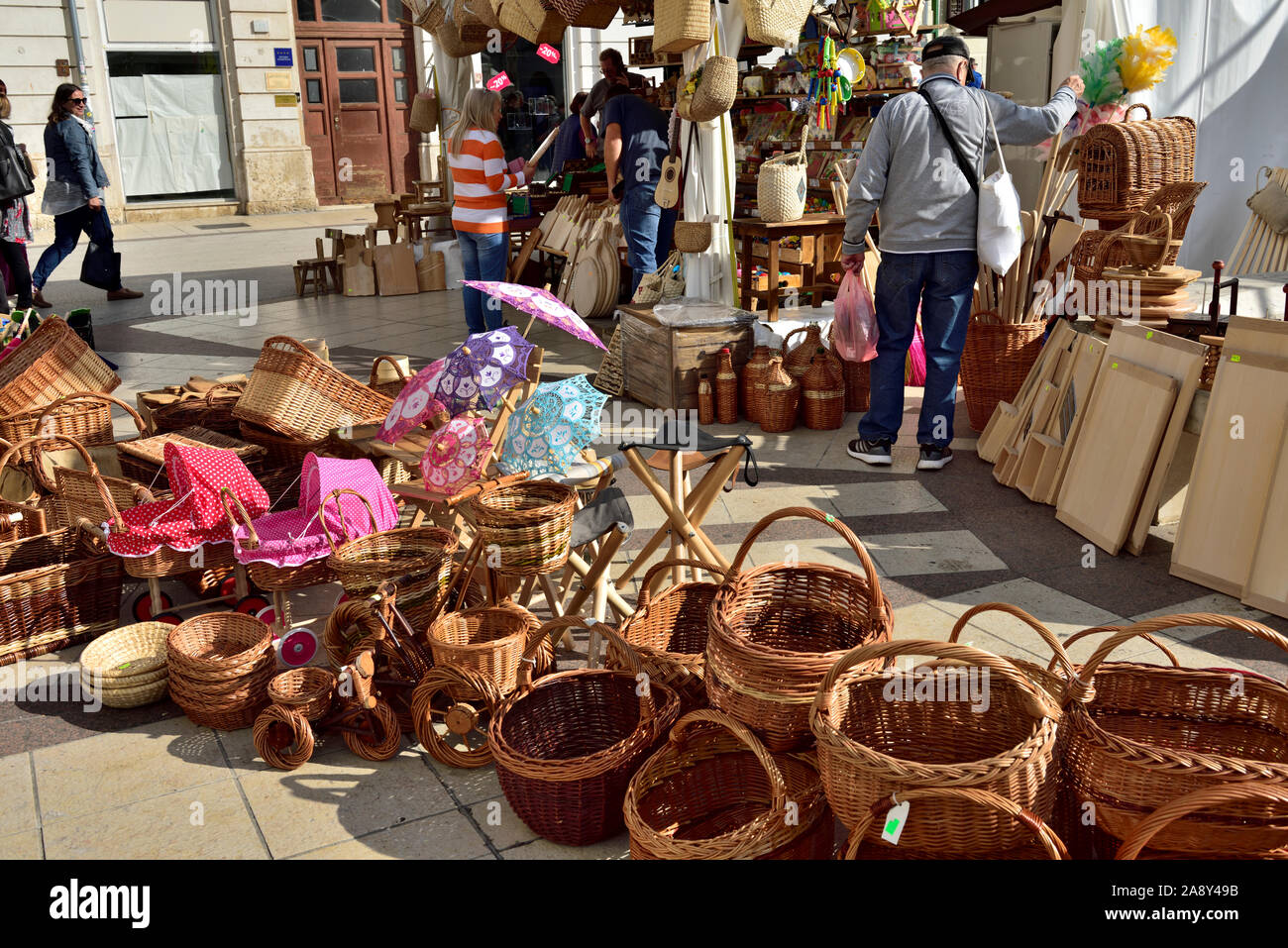 Market stall with display of wicker baskets, basketwork and other ...