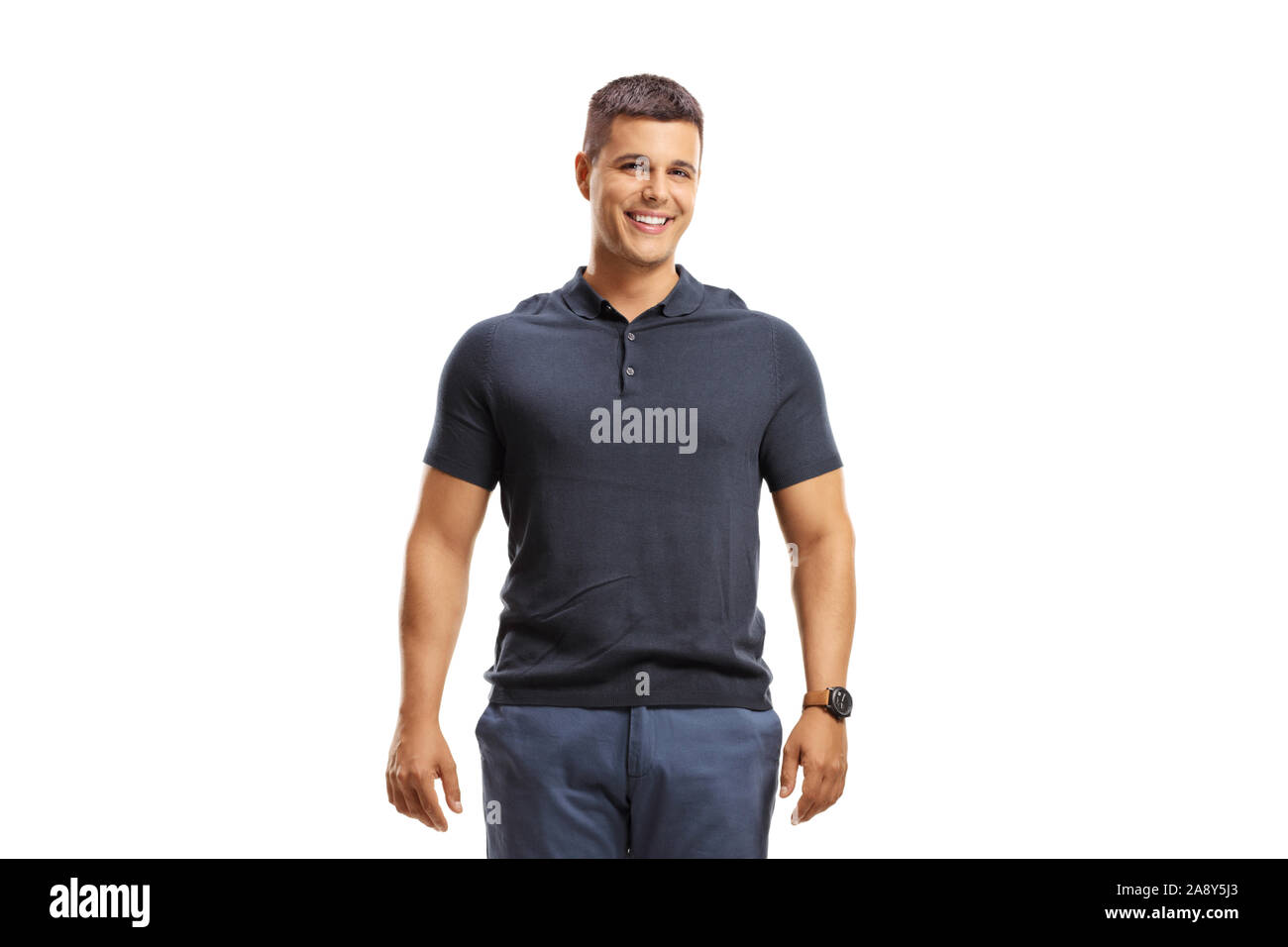 Handsome young man standing and looking at the camera isolated on white ...